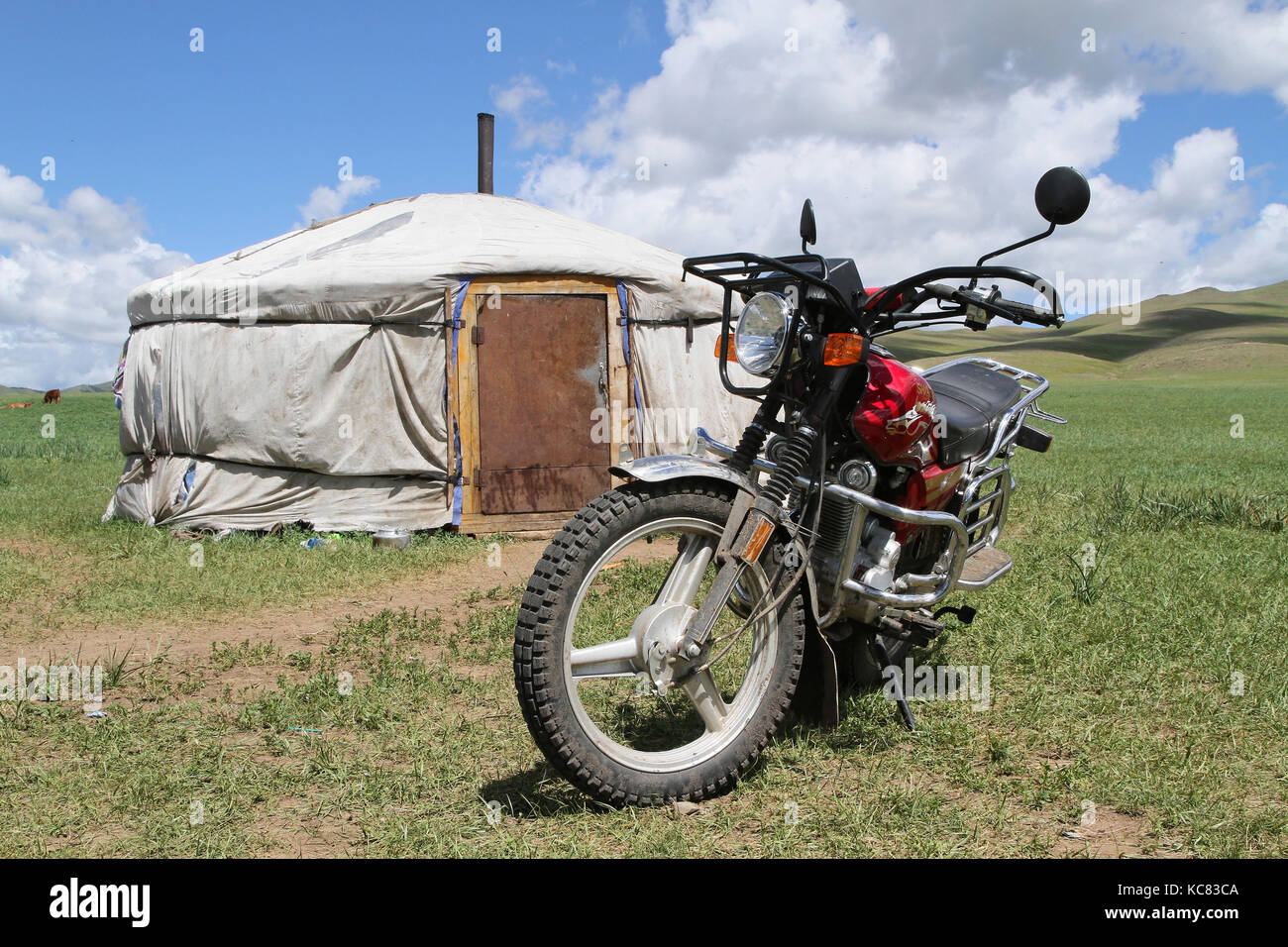 BAT-ULZII, MONGOLIA, July 11, 2013 : Yurt and motorbike in the steppe ...
