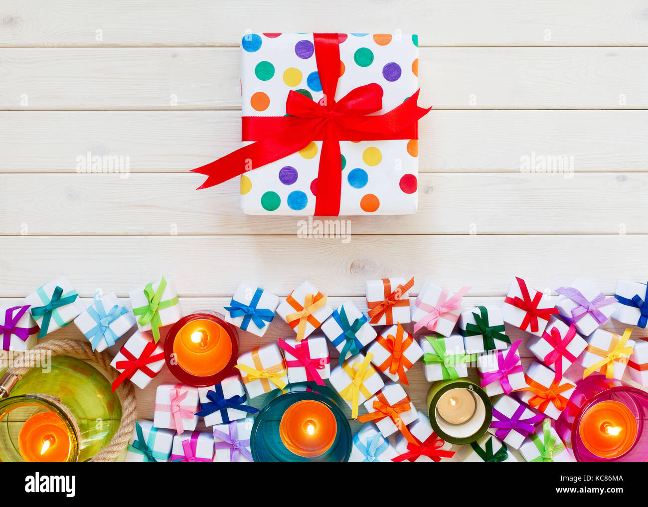Colorful gift boxes on white background Stock Photo - Alamy