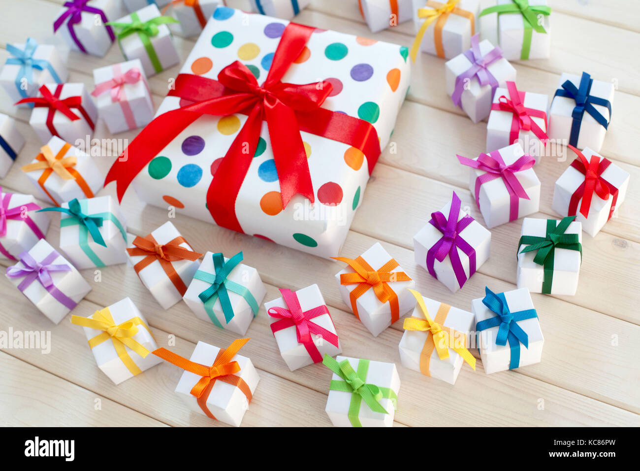 Colorful gift boxes on white background Stock Photo - Alamy