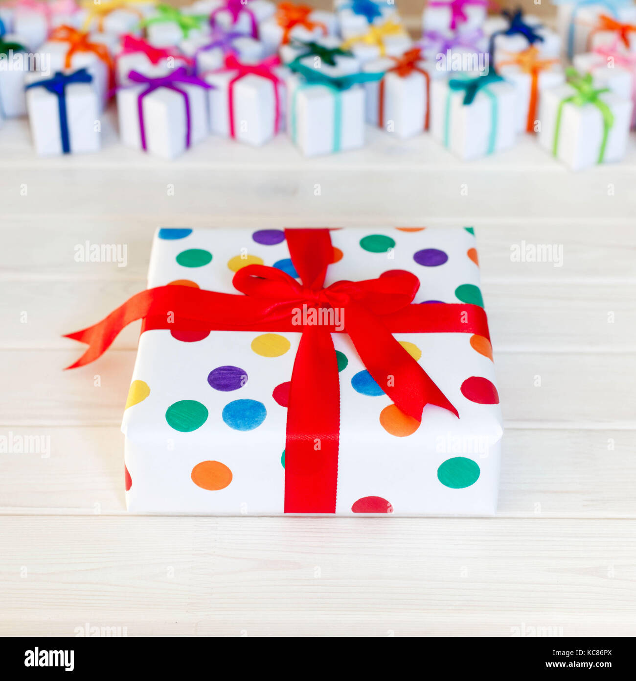 Colorful gift boxes on white background Stock Photo - Alamy