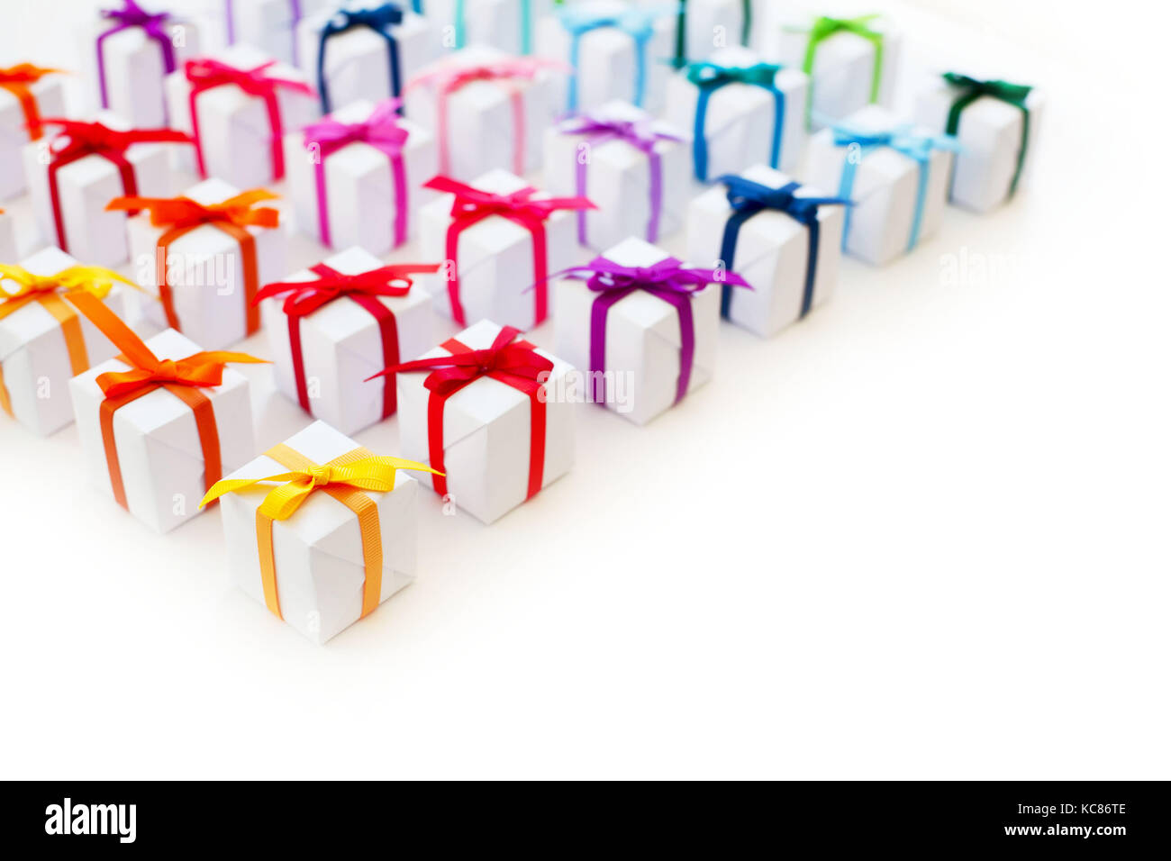 Colorful gift boxes on white background Stock Photo - Alamy