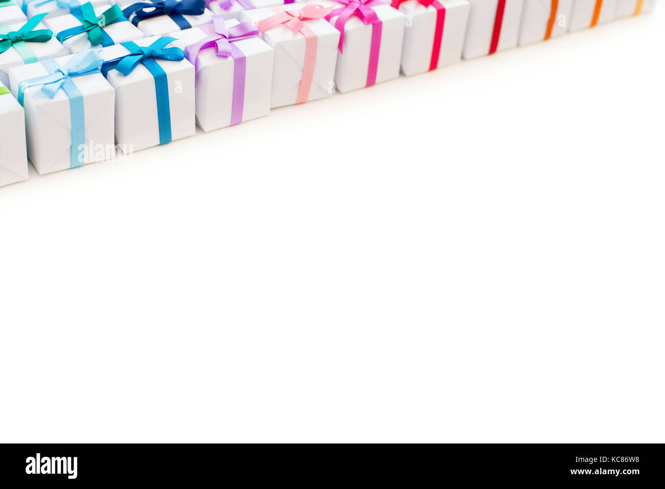 Colorful gift boxes on white background Stock Photo - Alamy