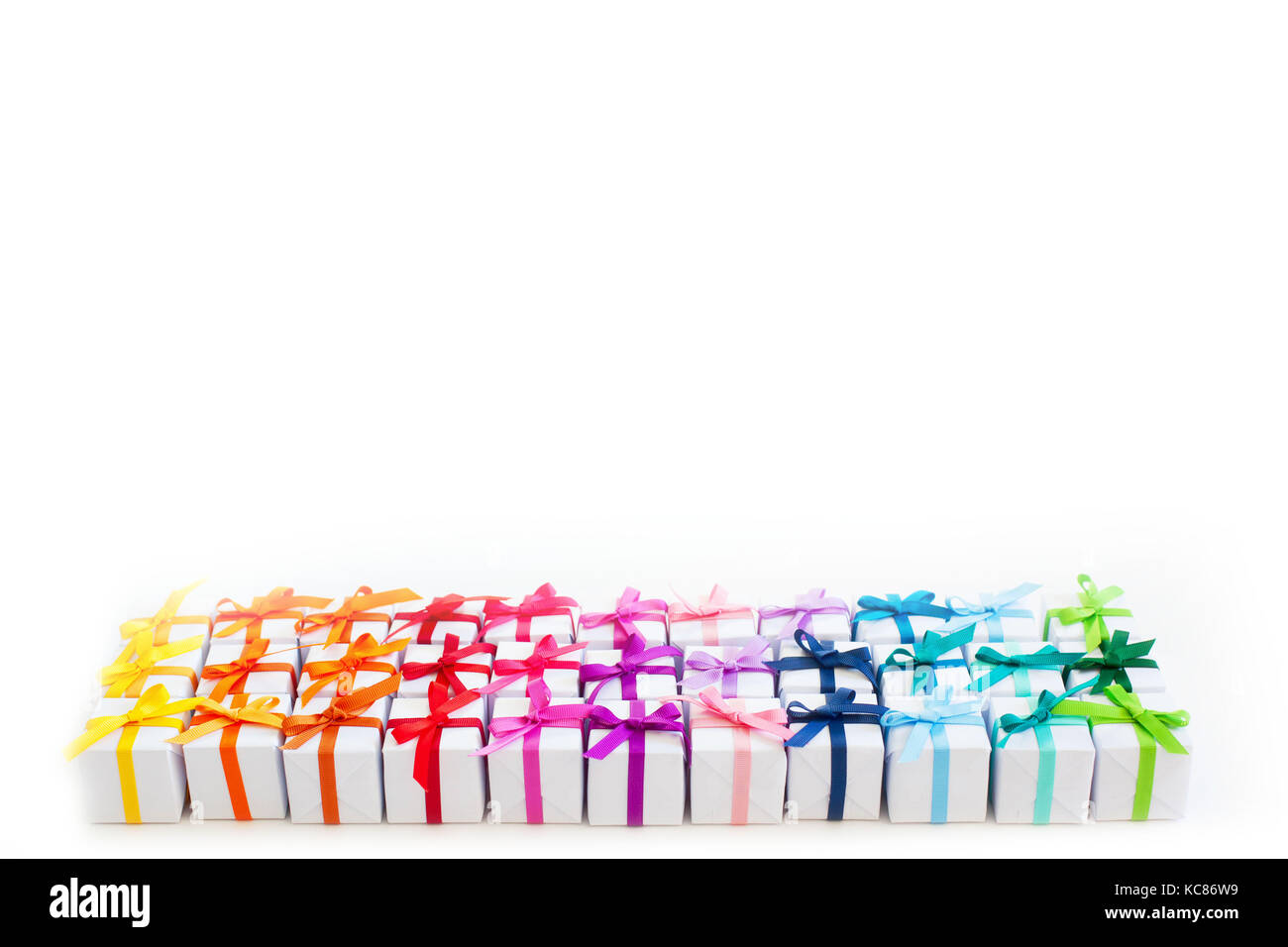 Colorful gift boxes on white background Stock Photo - Alamy