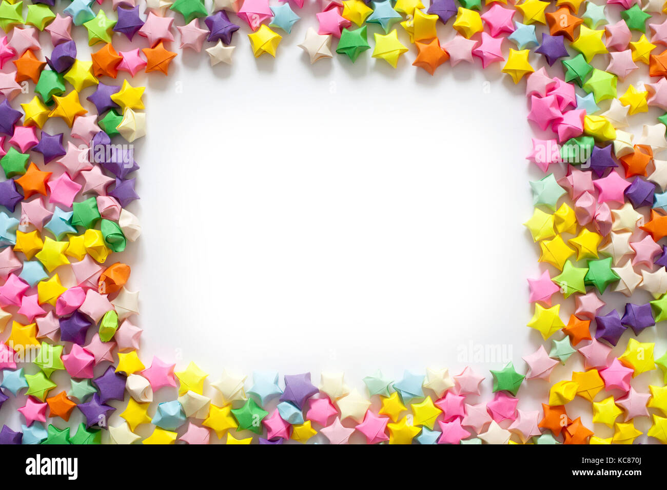 Colorful folded paper star or origami lucky star to use as frame Stock ...