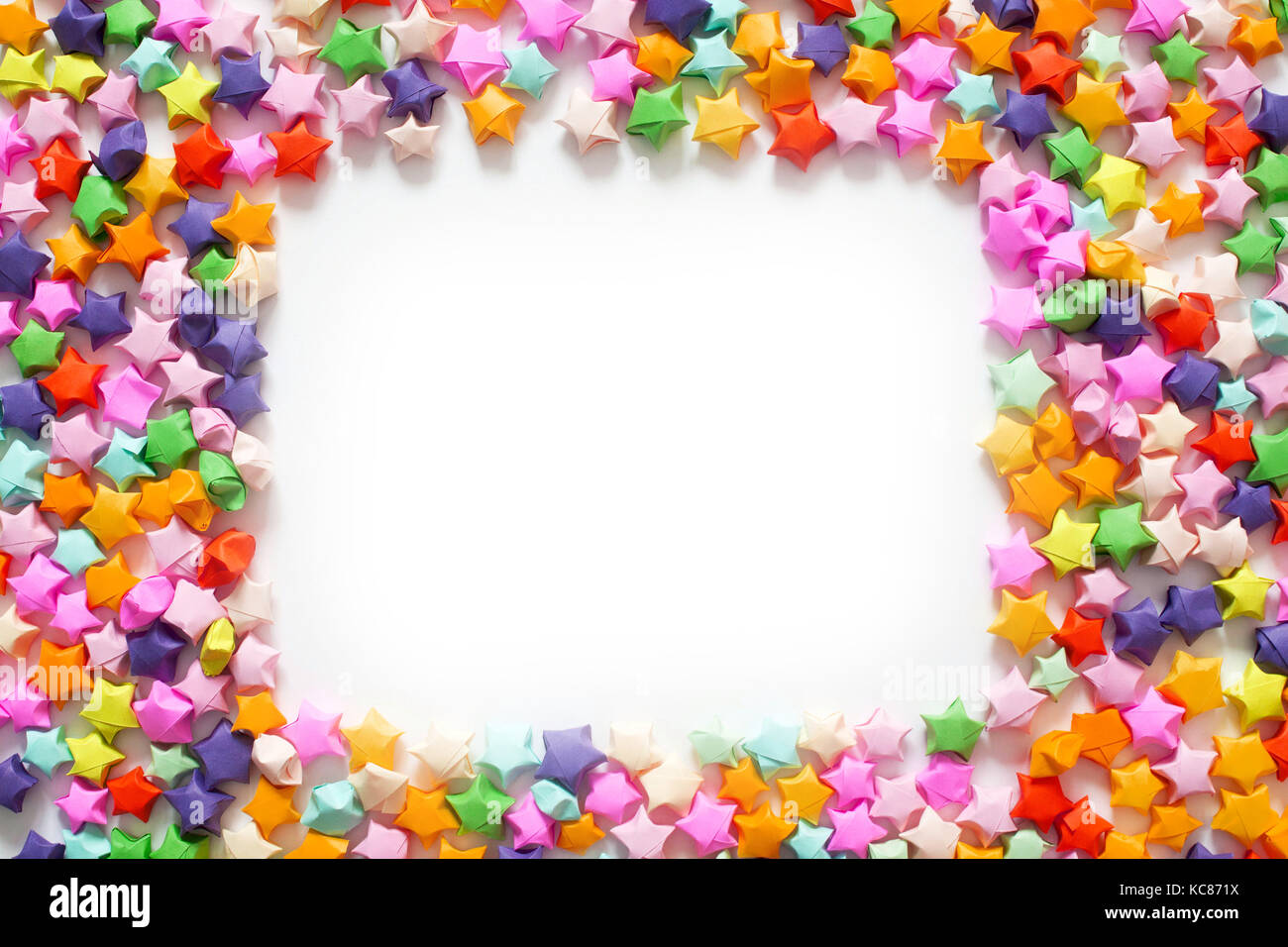 Colorful folded paper star or origami lucky star to use as frame Stock ...