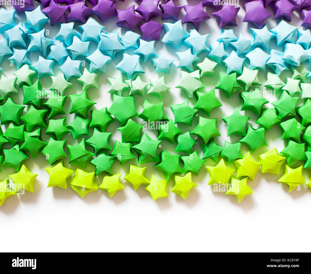 Origami stars background Stock Photo - Alamy