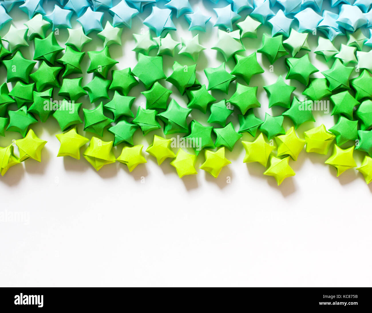Origami stars background Stock Photo - Alamy