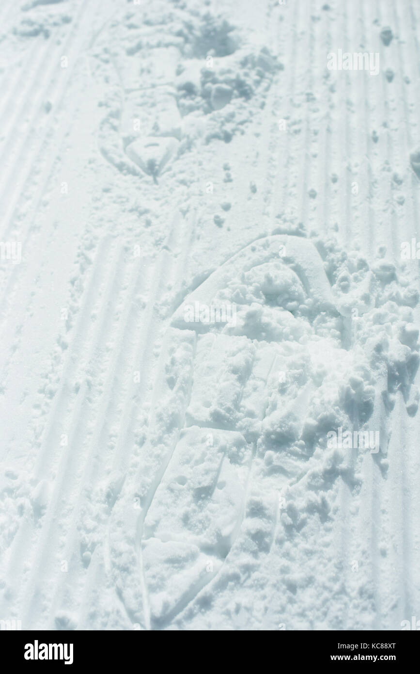 Footprints in the snow, abstract winter background Stock Photo - Alamy
