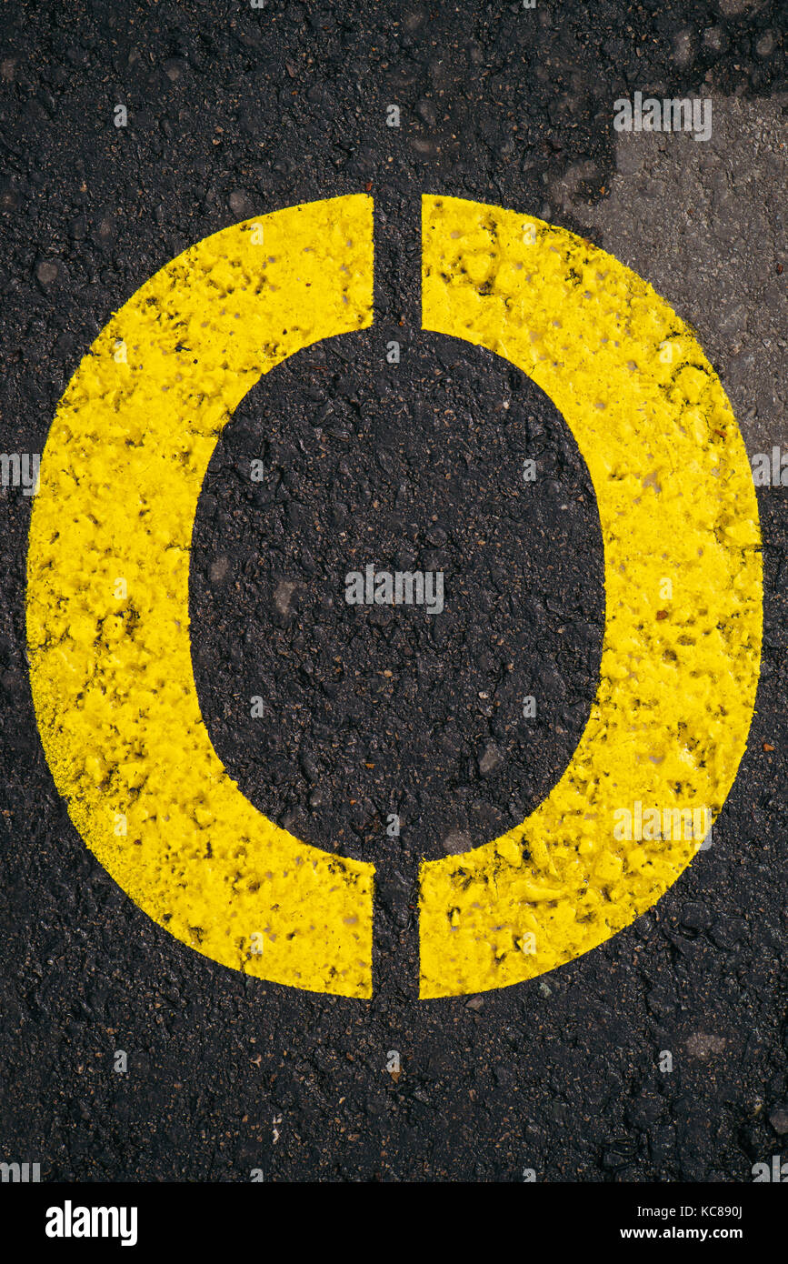 Letter O on asphalt road, top view Stock Photo - Alamy