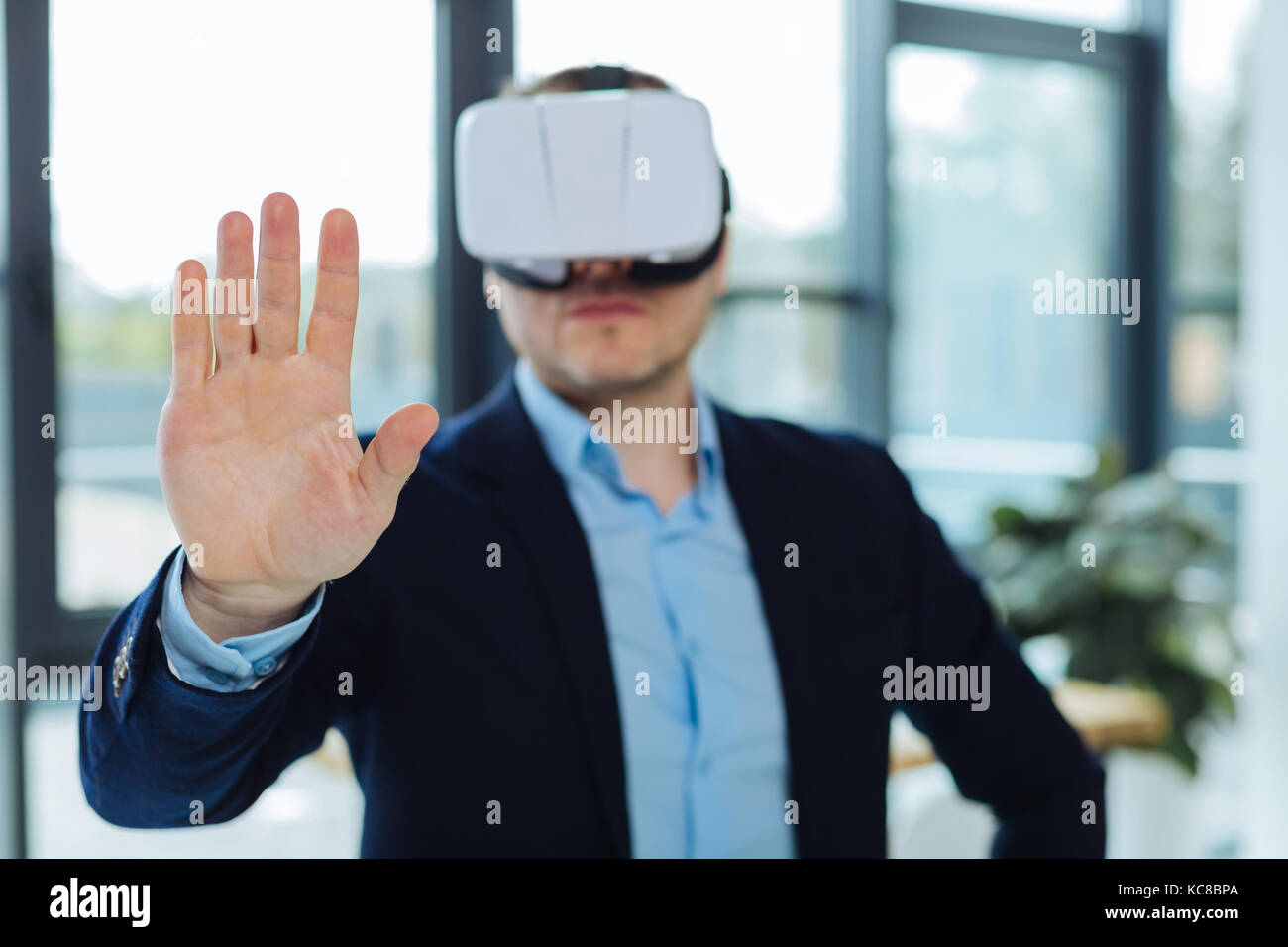 Selective focus of a male hand pressed to the sensory screen Stock ...