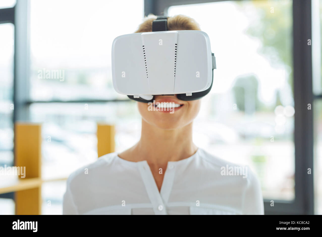 Portrait of a happy delighted woman Stock Photo - Alamy