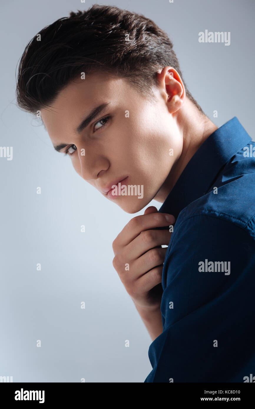 Portrait of delighted man that watching you Stock Photo - Alamy