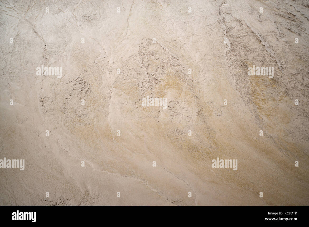 Water erosion and mud flows in bank of tidal River Usk, Newport, UK ...