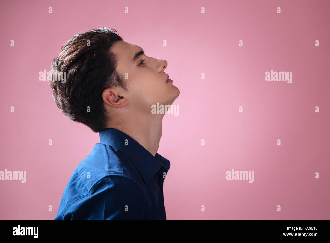 Frustrated male person standing in semi position Stock Photo - Alamy