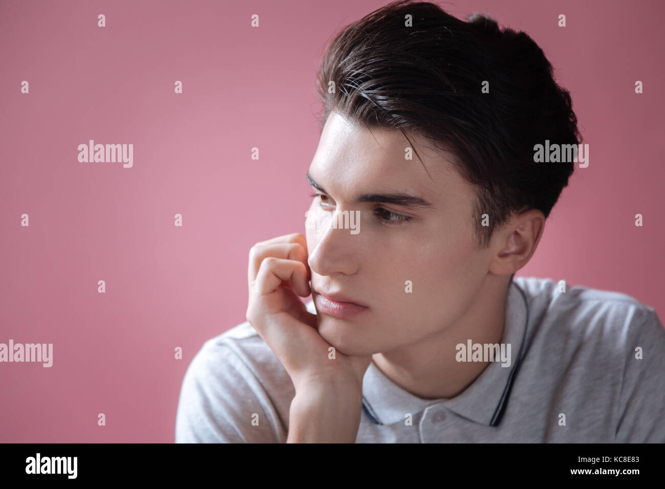 Portrait of serious boy that being deep in dreams Stock Photo - Alamy