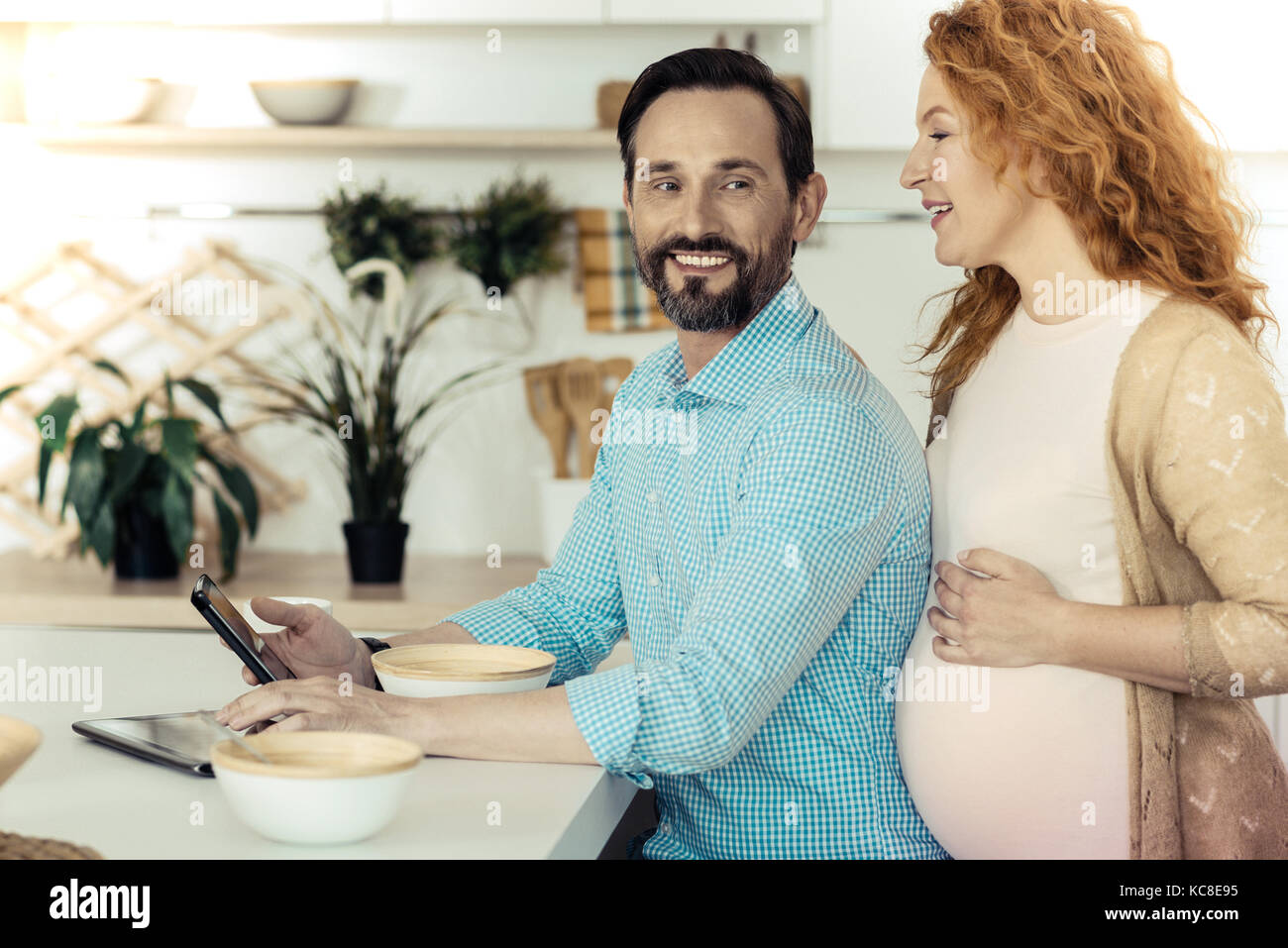 Positive family having splendid time together Stock Photo - Alamy