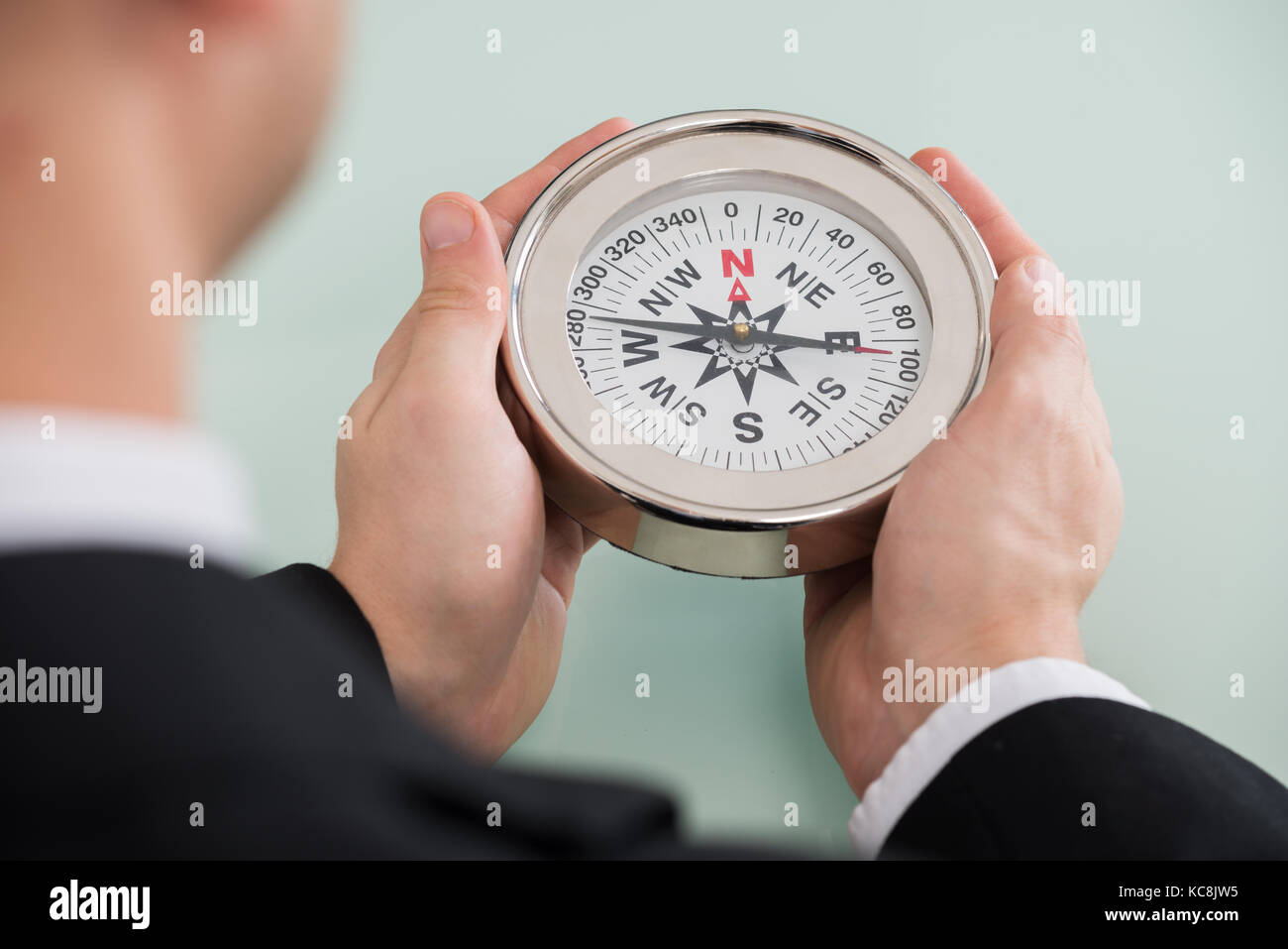 Close-up Photo Of Person Hand With Compass Stock Photo - Alamy