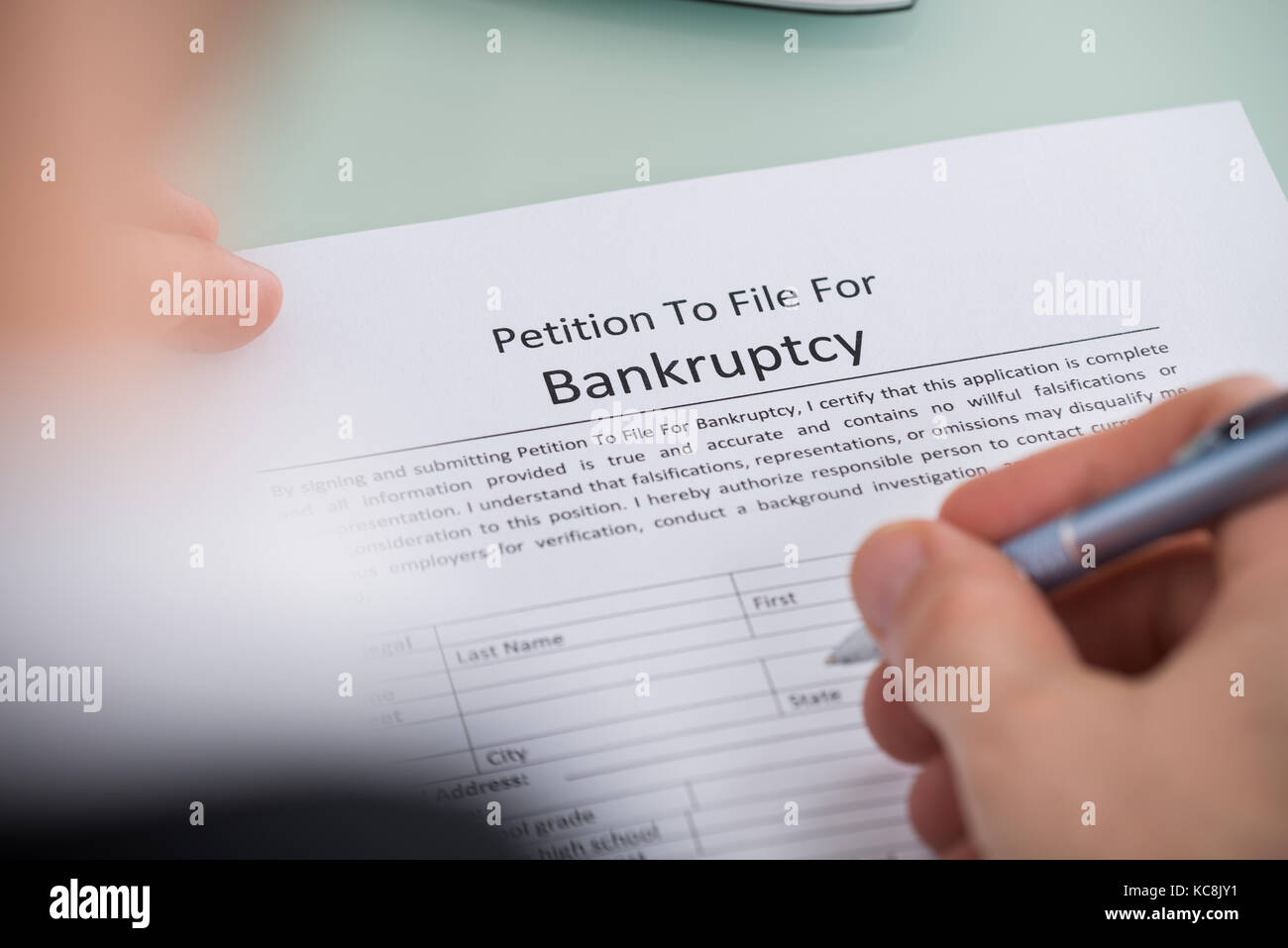 Close-up Photo Of Person Hand Filling Form Stock Photo - Alamy