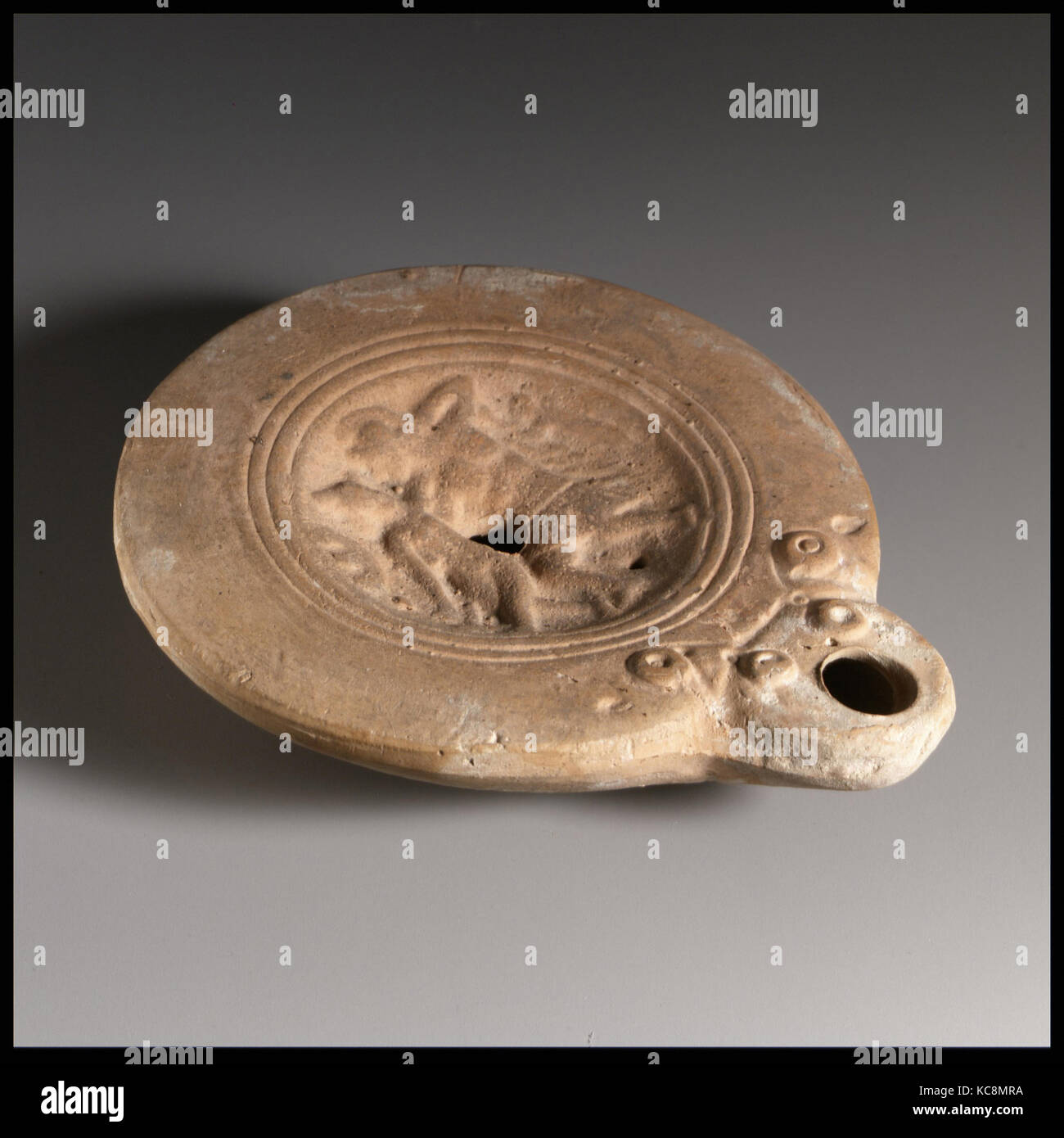 Lamp, Roman, Terracotta, Overall: 1 x 4 1/8 in. (2.5 x 10.5 cm ...