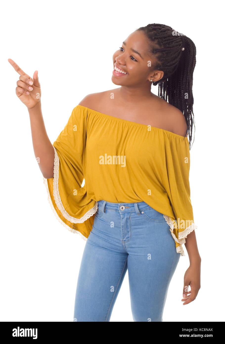 Happy african girl pointing, isolated on white background Stock Photo ...