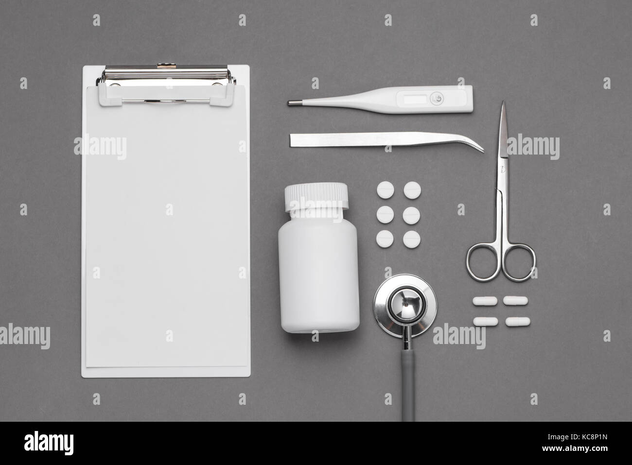 Top view of doctor desk table with stethoscope and medical items. Flat ...