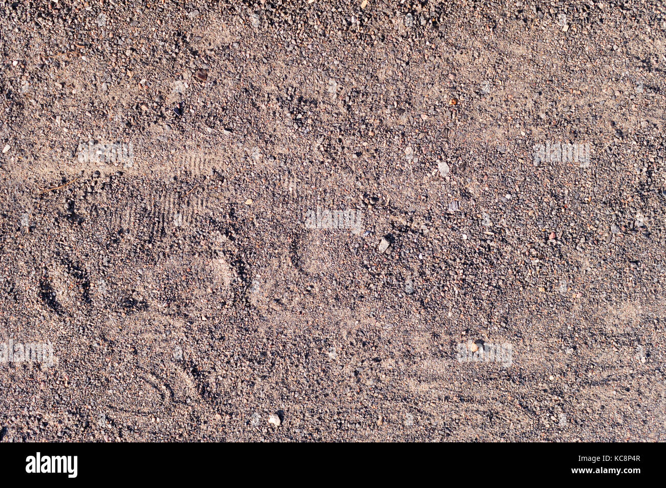 sandy path road with boot tracks. background, texture Stock Photo - Alamy