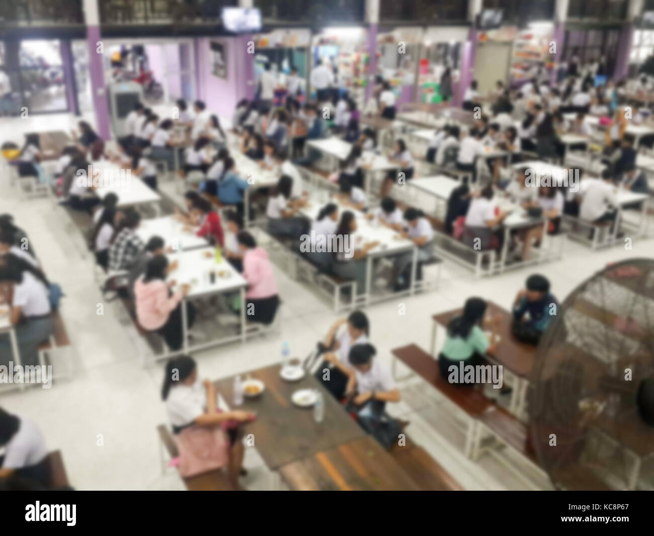 Blur image Canteen Dining Hall Room, A lot of people are eating food in University canteen blur ...