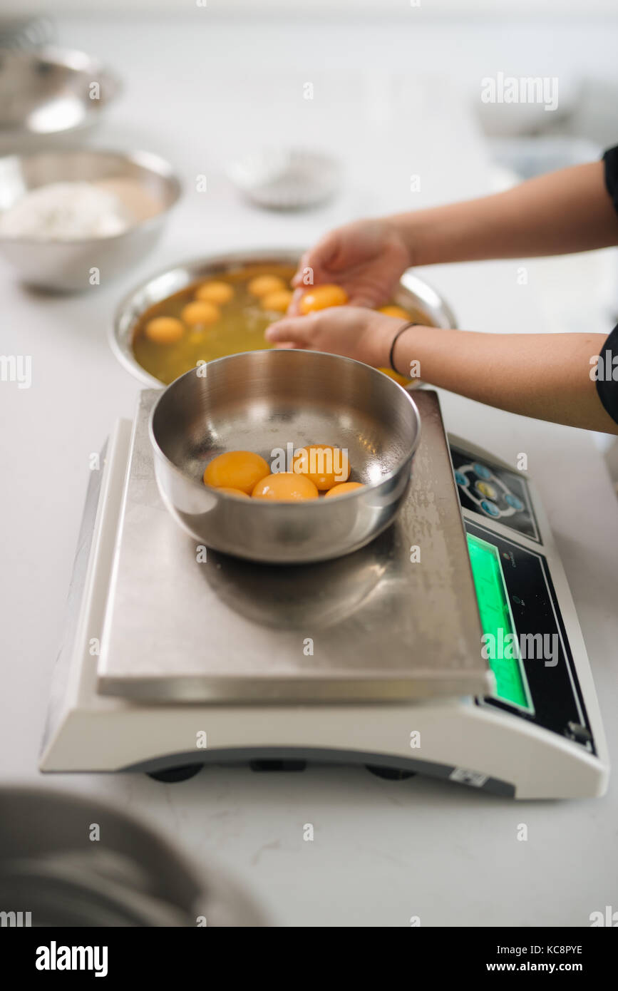 Bakery chef cooking bake in the kitchen professional Stock Photo - Alamy