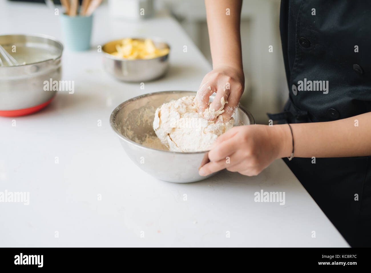 Bakery chef cooking bake in the kitchen professional Stock Photo - Alamy