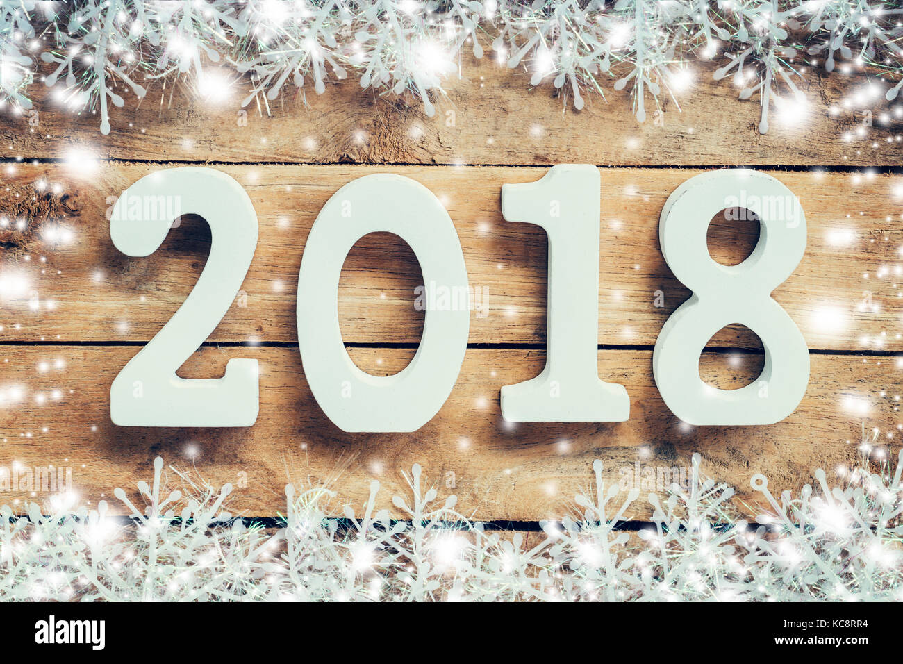 Wooden numbers forming the number 2018, For the new year and white snow ...