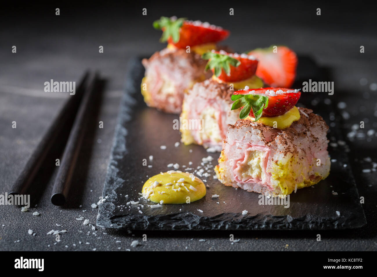 Delicious sweet sushi with cinnamon and chocolate Stock Photo - Alamy