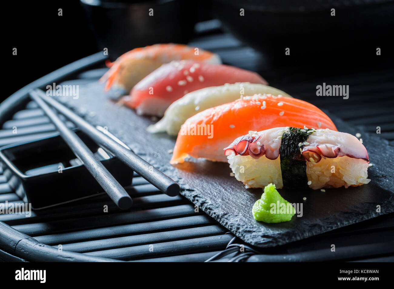 Enjoy your Nigiri sushi made of fresh seafood Stock Photo - Alamy