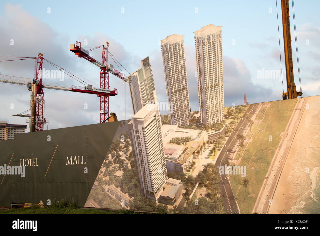 Construction site building activity image with cranes neat Twin Towers ...