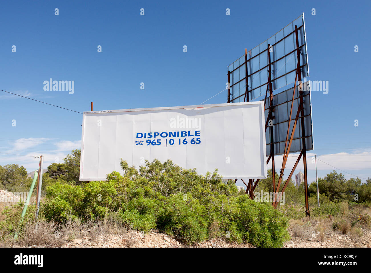 Advertising hoarding by the roadside Stock Photo - Alamy