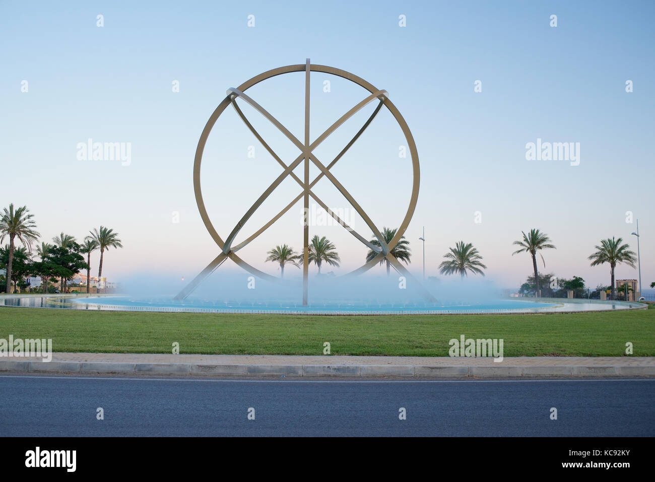 Structure in the centerpiece of a roundabout on the road Stock Photo ...