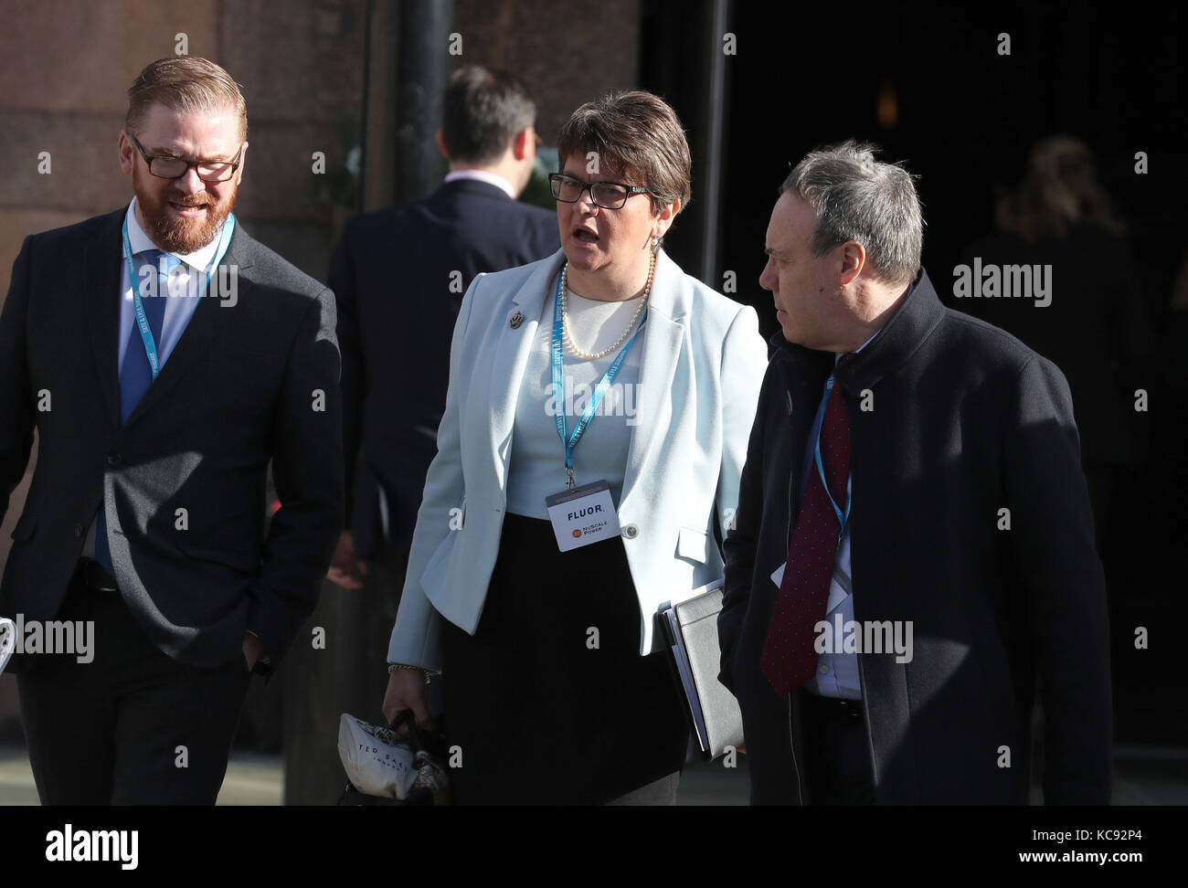 DUP leader Arlene Foster speaks alongside her party colleagues Nigel ...