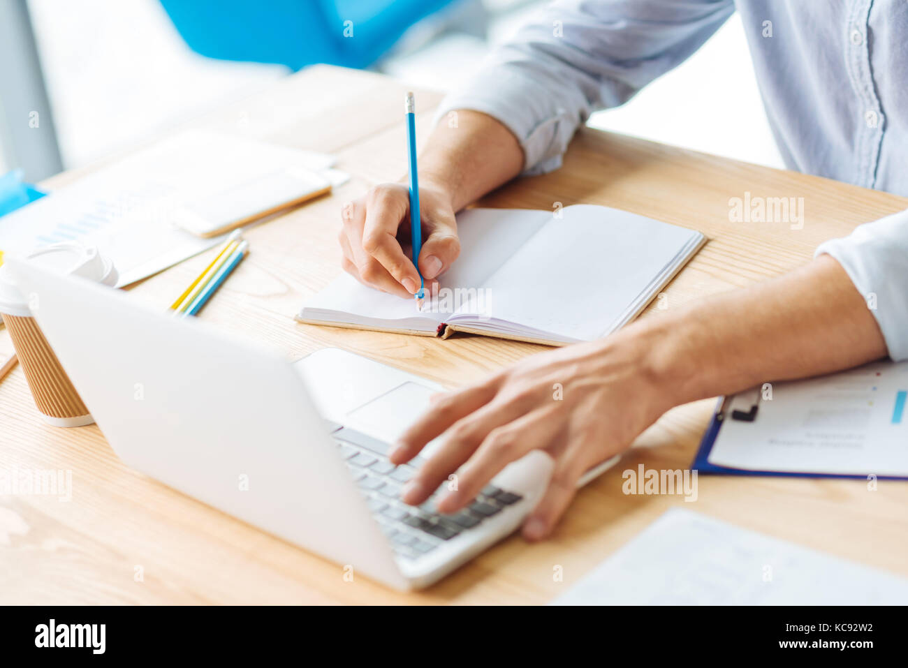 Male hands being on the table Stock Photo - Alamy