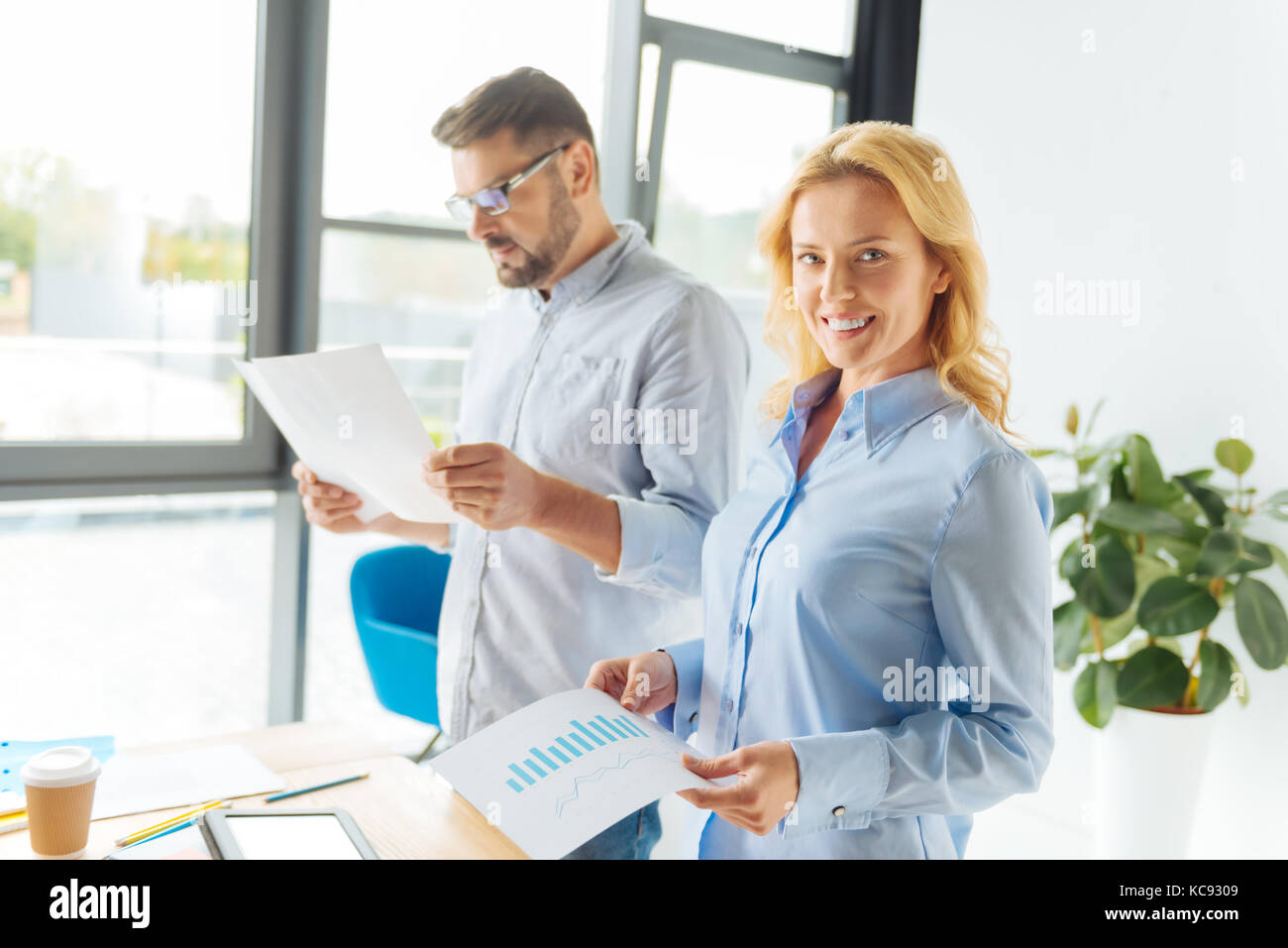 Happy female person posing on camera Stock Photo - Alamy