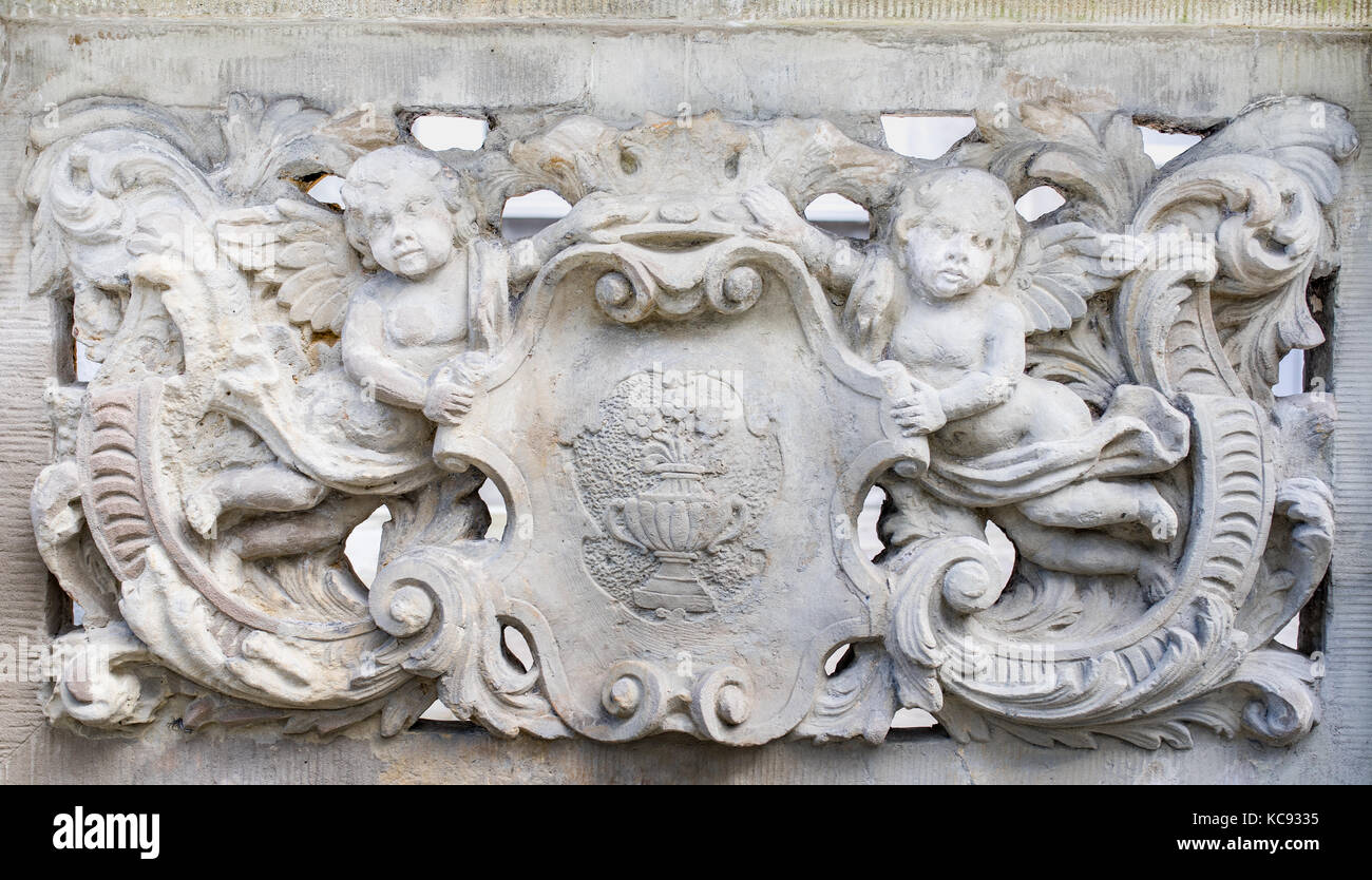 Ornaments, mouldings, gargoyle, low reliefs in a sandstone, granite ...
