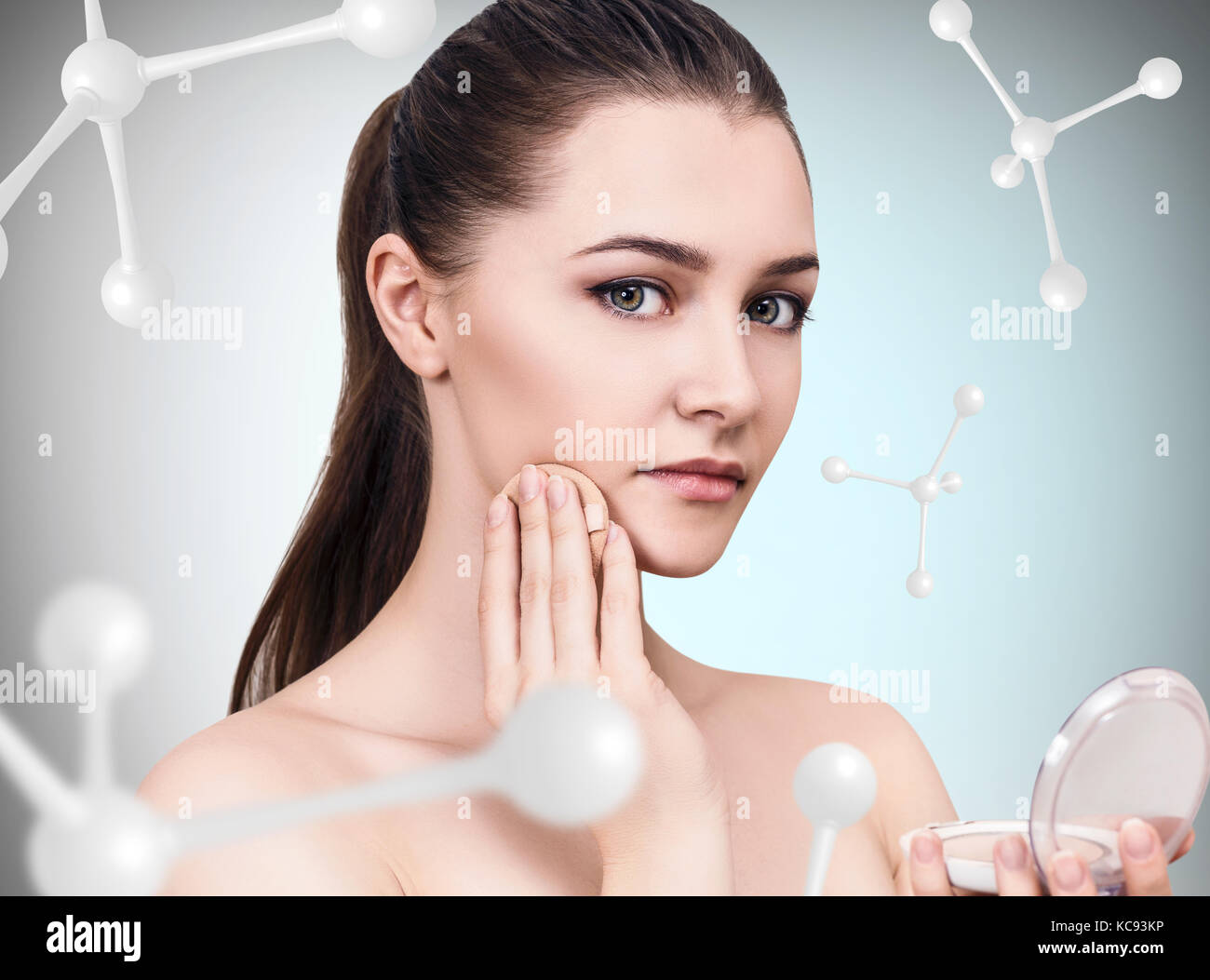 Beautiful young woman among molecules Stock Photo - Alamy