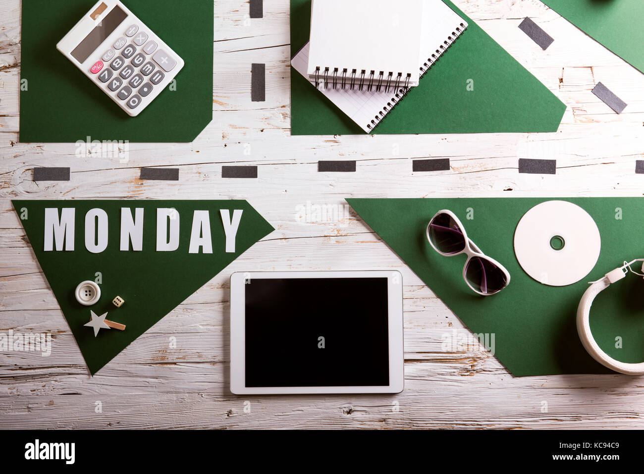 Desk with school supplies. Studio shot on white wooden background. Flat ...