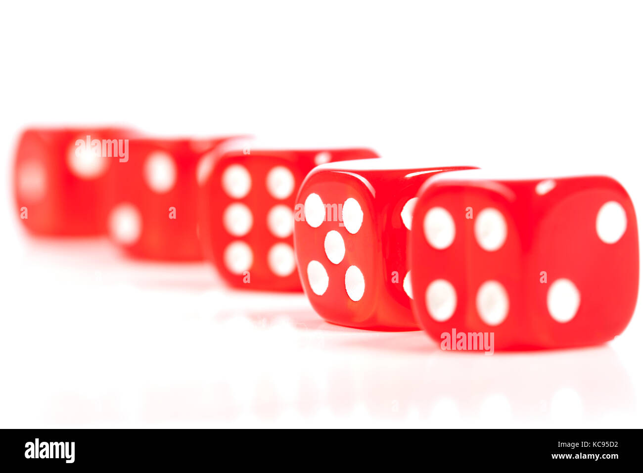 Red Casino Dice Row Focus on Five Isolated on White Bckground Stock ...