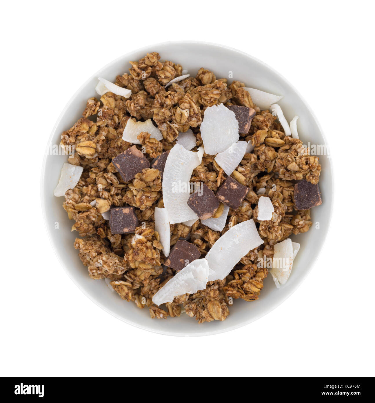 Top view of a bowl filled with organic granola isolated on a white ...