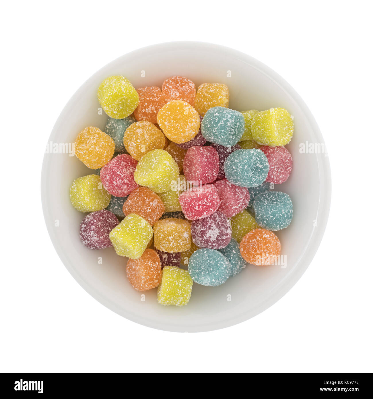 Top view of a small bowl filled with sugar coated gummy candy isolated ...