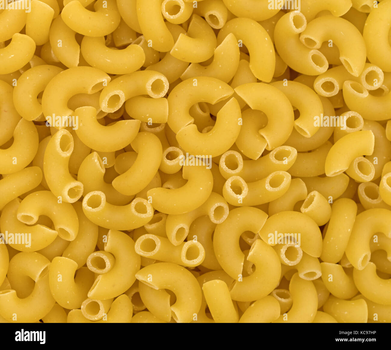A very close view of small yellow elbow macaroni Stock Photo - Alamy