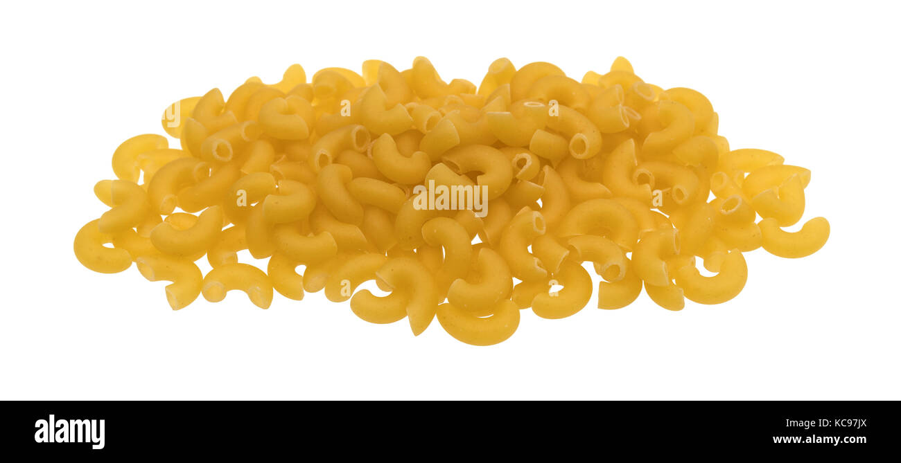 A small pile of yellow elbow macaroni isolated on white background ...