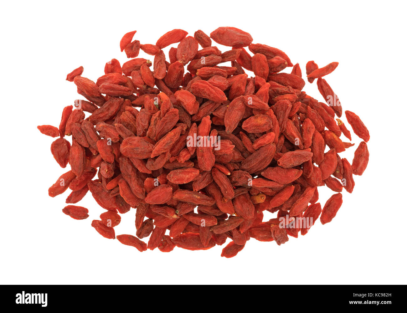 Top view of a small pile of dried wolfberry fruit isolated on a white ...