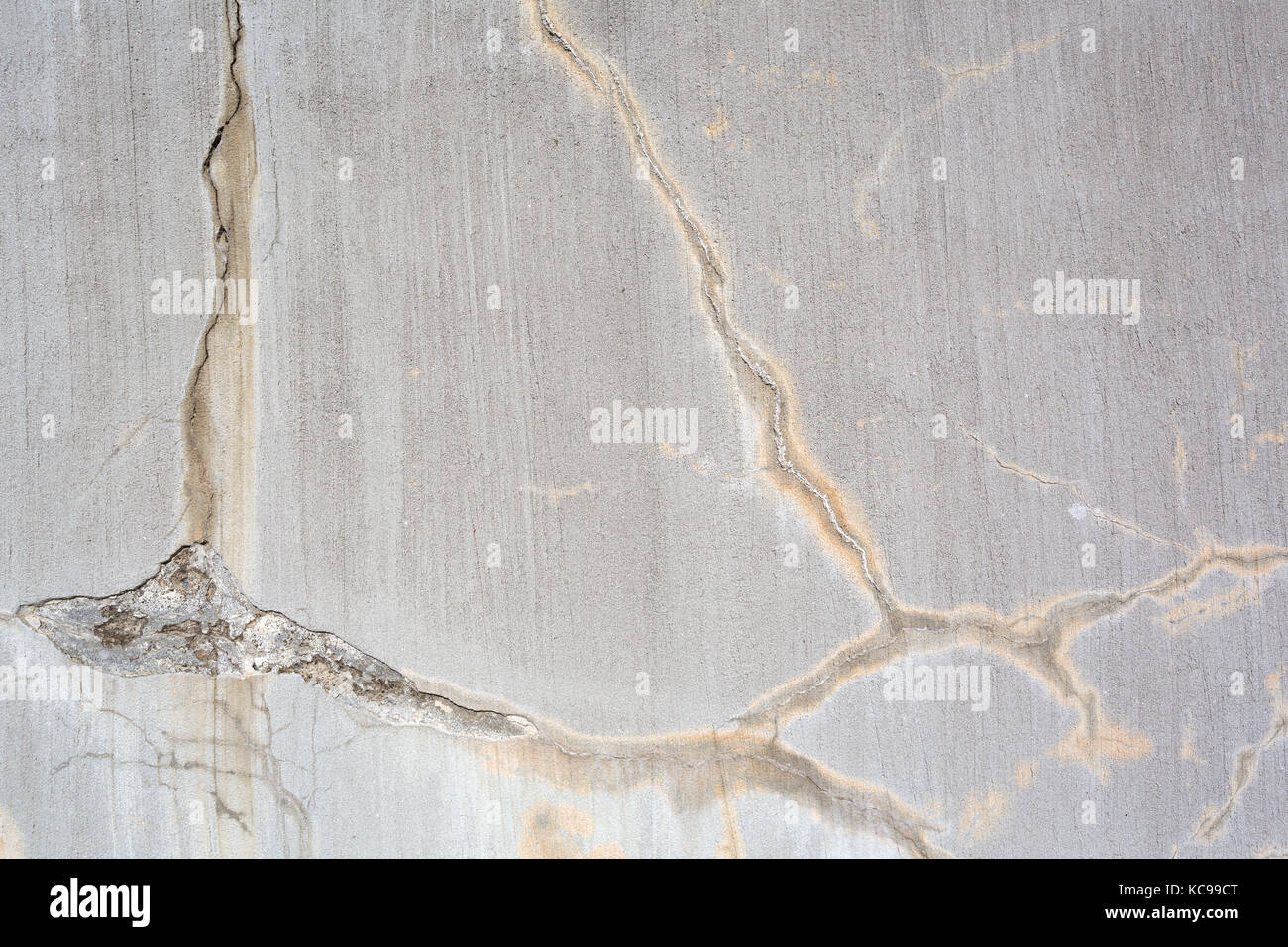 Cracks and surface damage on a concrete retaining wall Stock Photo - Alamy
