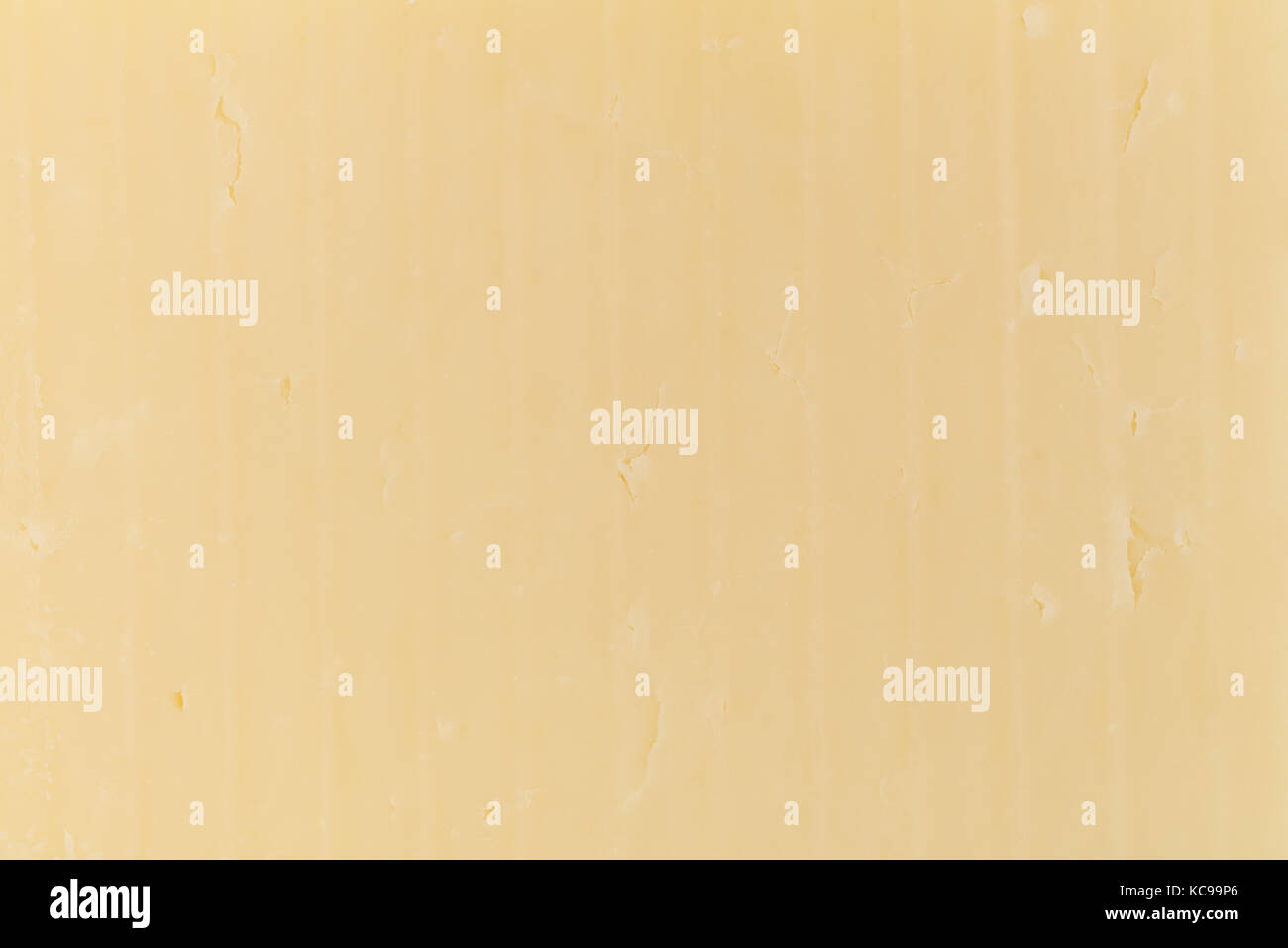 Close view white sharp cheddar cheese slices Stock Photo - Alamy