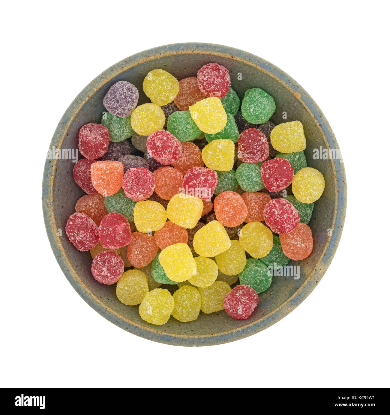 Top view of a bowl filled with assorted flavors of gummy drop shaped ...